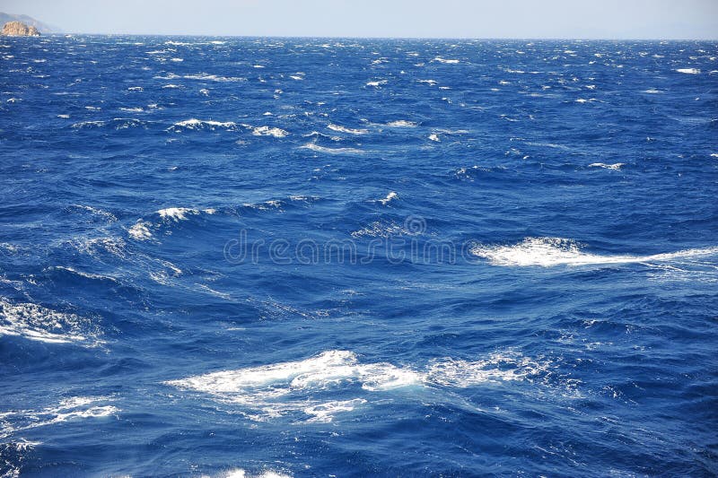 Blue waves in open sea stock image. Image of seascape - 115606163