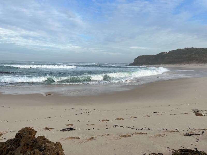 Blue Waves Touching the Sandy Beach Line Stock Image - Image of white ...