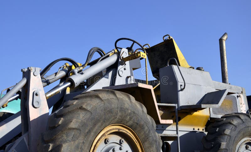 Blue Wheel Dozer stock image. Image of move, earth, loader - 11588703