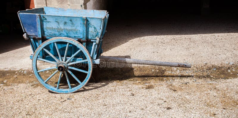 Blue Wheelbarrow stock image. Image of construction, work - 24654145