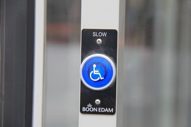 Blue Wheelchair Button on White Pole Stock Photo - Image of symbol ...