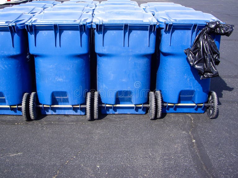 Blue Wheeled Trash Cans and Plastic Garbage Bag Stock Image - Image of ...