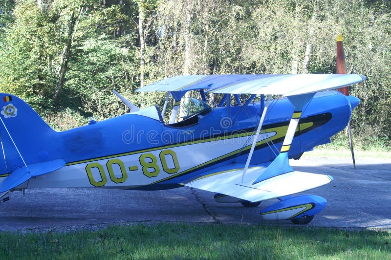 Blue and White Biplane Parked Outdoors Editorial Stock Photo - Image of ...