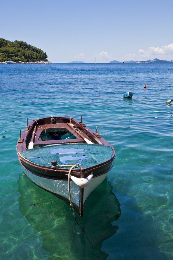 Blue and White Boat in Clear Blue Water Stock Image - Image of craft ...