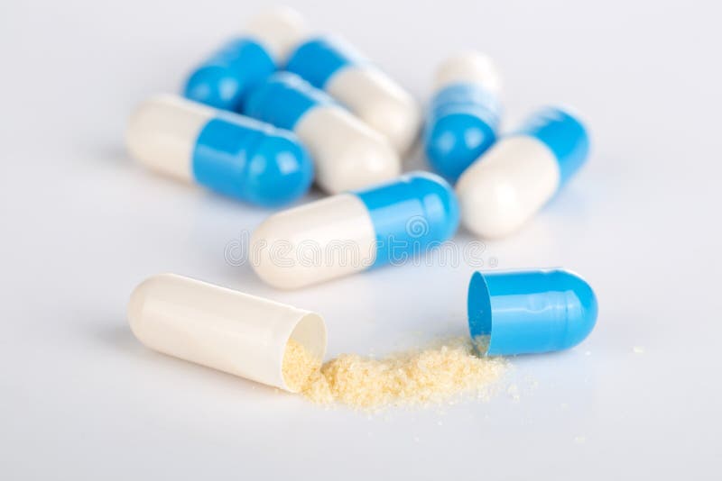 Blue and white capsule. stock image. Image of isolated - 96129589