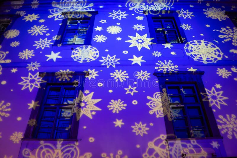 Blue and White Christmas Pattern Projected on a Building. Christmas ...