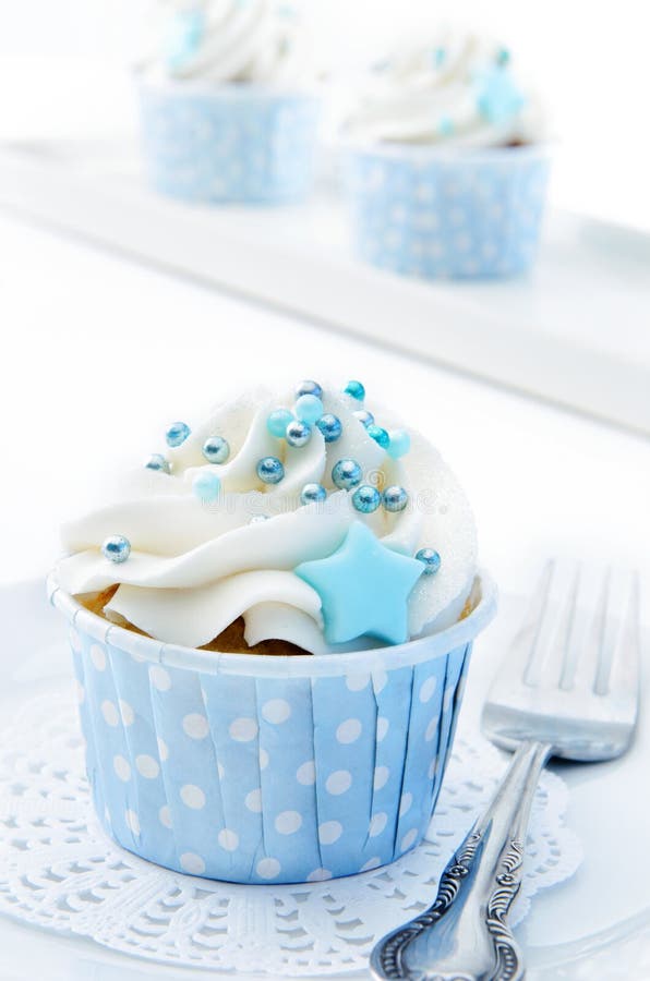 Blue and white cupcakes stock image. Image of delicious - 58027413