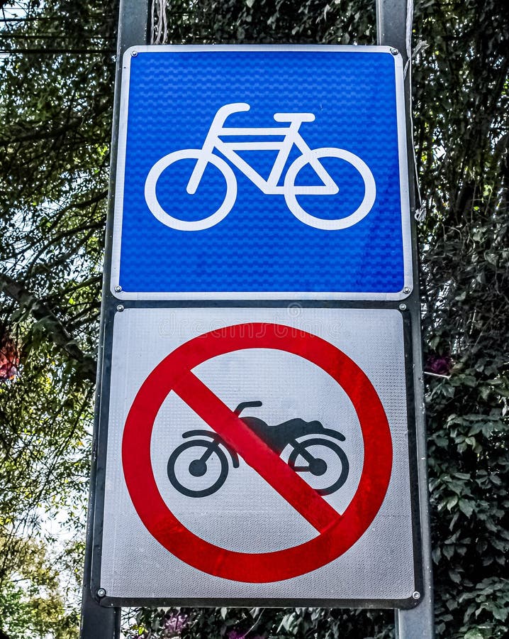 Cycling Road Sign and a Prohibition Road for Motorcycles. Stock Photo ...