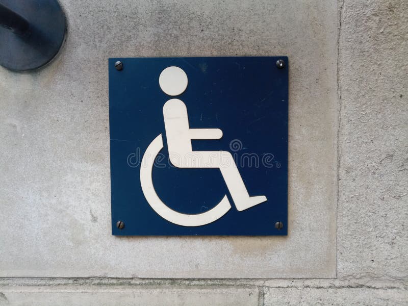 Square Disabled Sign on a Wall Stock Photo - Image of blue, wall: 110146080