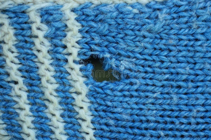 Fabric Texture of Crumpled Piece of Torn Clothes with a Hole Stock ...