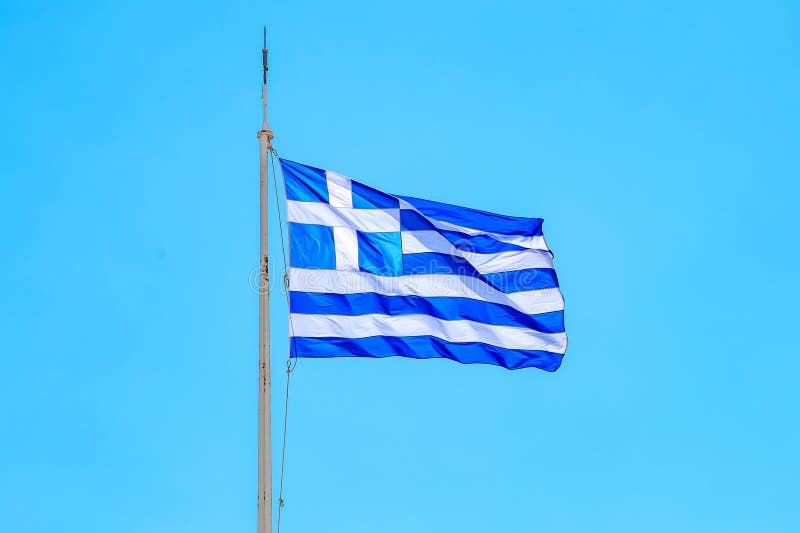 A Blue and White Flag with a White Cross on it, Greek Flag of the State ...