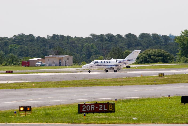 Blue and White Jet Taking Off Stock Photo - Image of tail, twin: 5794764