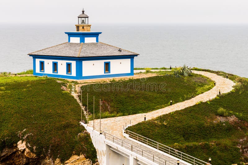 Blue and white lighthouse stock image. Image of coast - 94762739