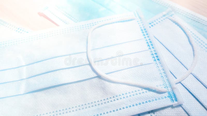 Blue White Medical Face Masks on the Table. Side View, Close Up Stock ...