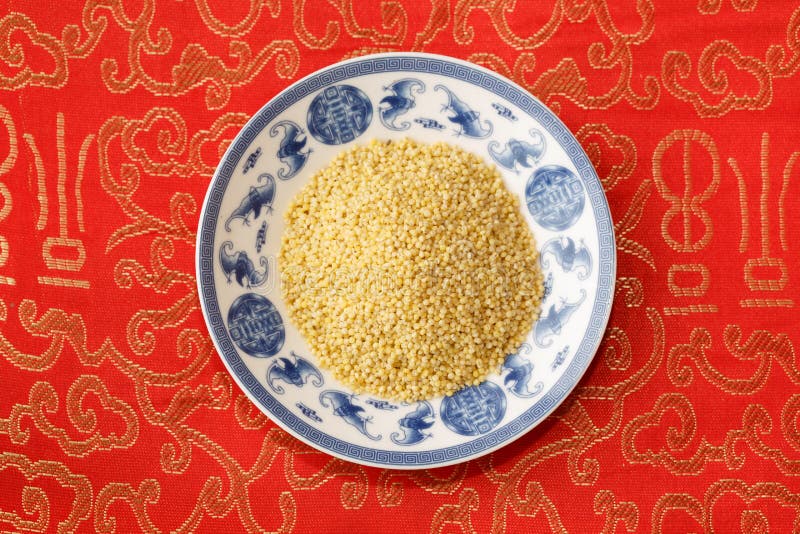 The Blue and White Porcelain Plate with Millet Stock Photo - Image of ...