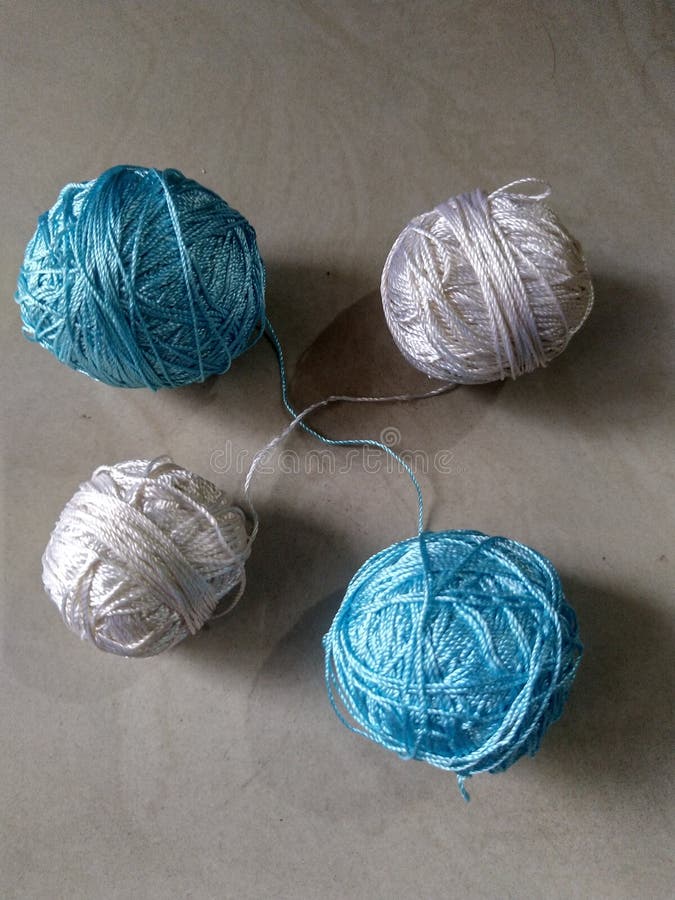 Blue and White Silk Thread Rolls on Floor. Stock Photo - Image of lying ...