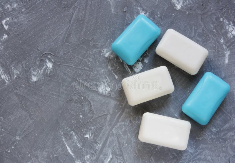 Soap Pieces on Gray Background Stock Photo - Image of lather, shiny ...