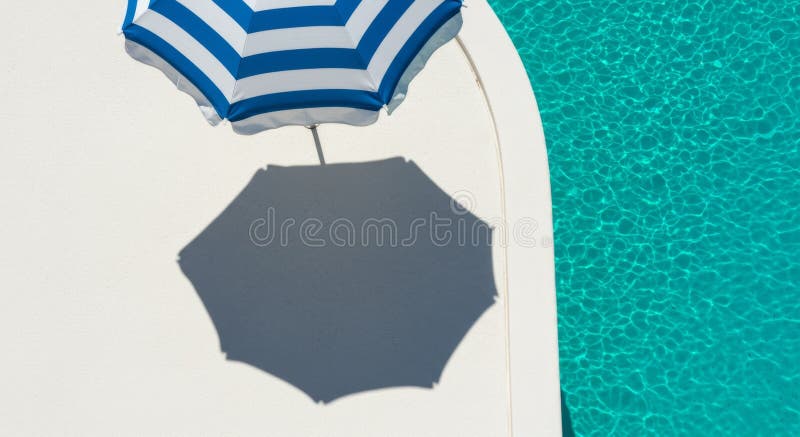 Blue and White Striped Beach Umbrella beside Teal Pool Stock ...