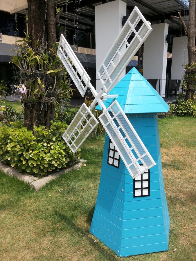 Blue Sky and Windmill Reflected in River Stock Photo - Image of ...