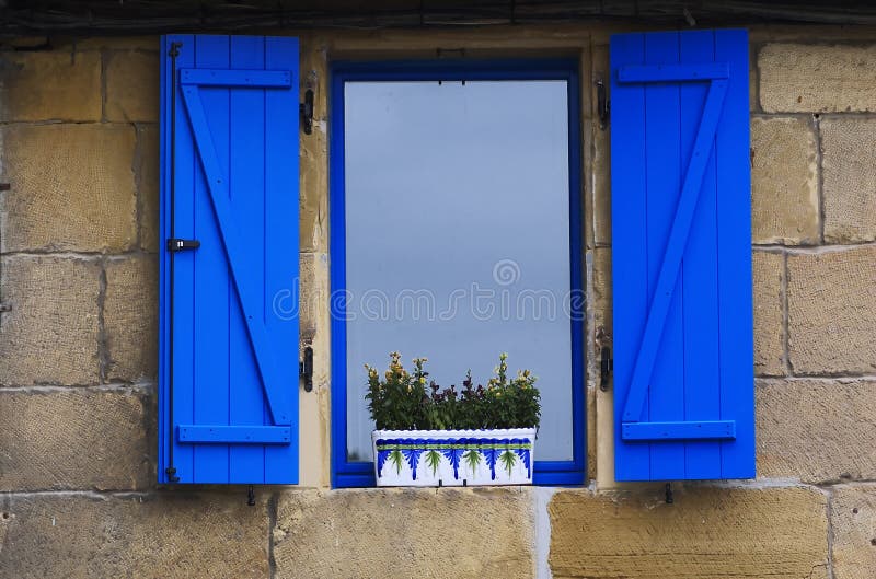 Blue window stock image. Image of house, flowers, stones - 2754105