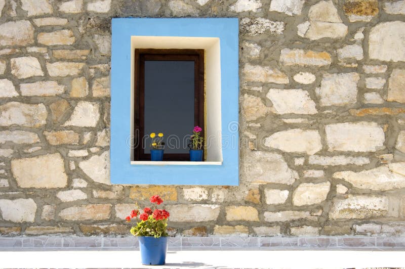 Blue Window Frame with Flowers Stock Photo - Image of rock, rocks: 5803920