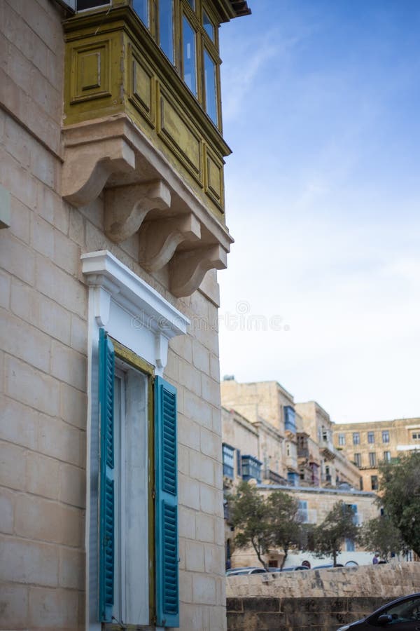 Blue Window and Golden Balcony on a Typical Traditional Architecture in ...