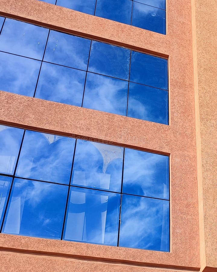 Blue windows of a building stock photo. Image of wood - 241604150
