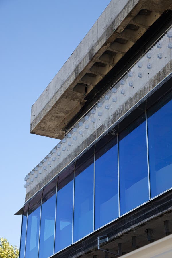 Blue Windows in Modern Business Building Construction Stock Image ...