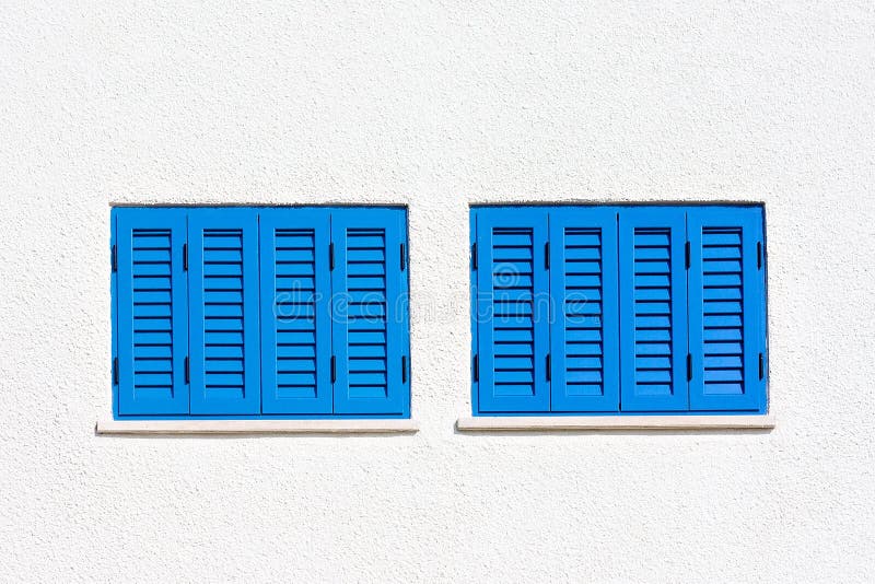 Blue Windows on the White Wall Stock Photo - Image of middle, city ...