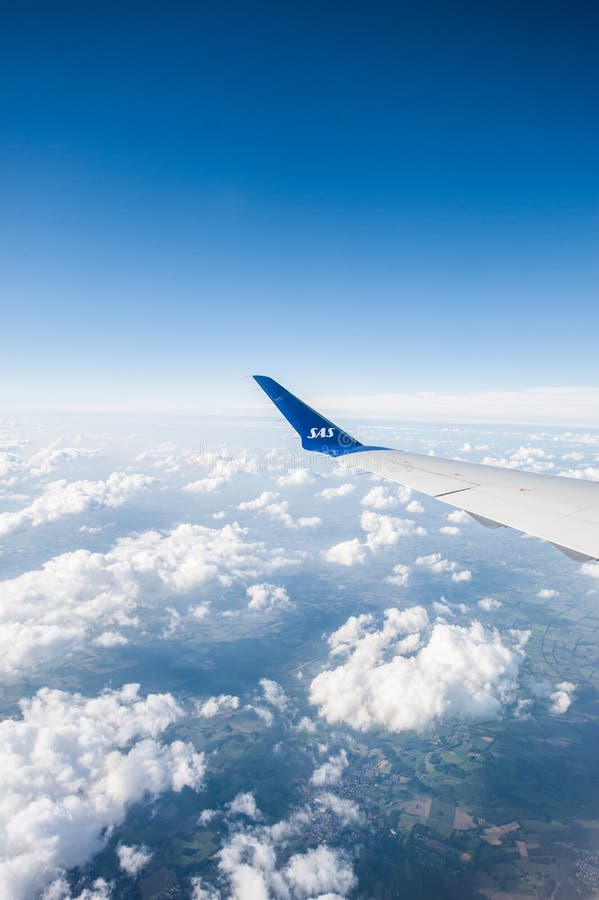 Blue Winglet of a SAS Airplane at Altitude.. Editorial Photo - Image of ...
