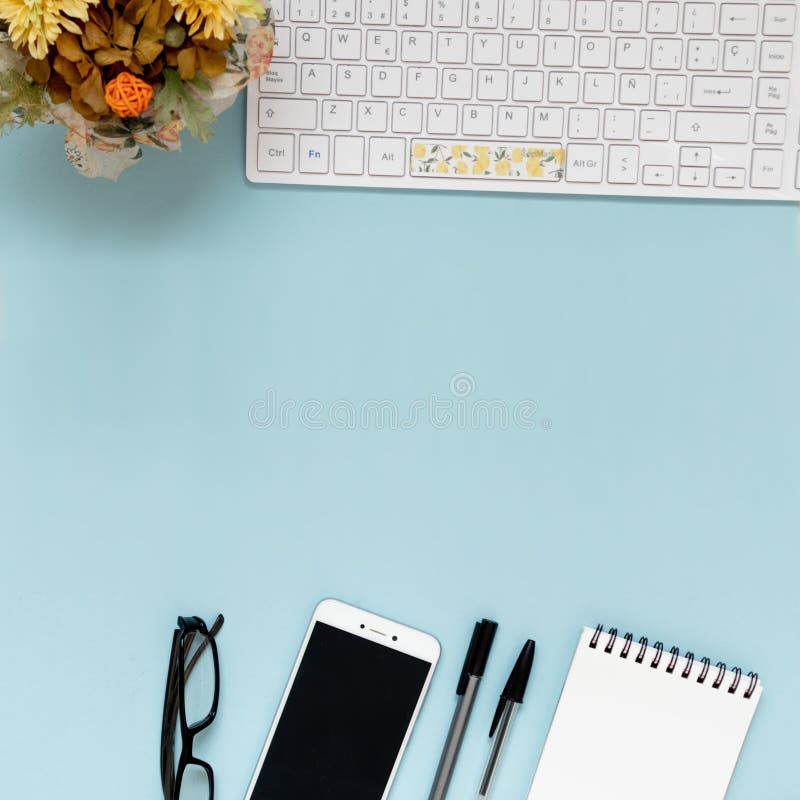 Blue Workspace, with Computer Keyboard and Phone. Copy Space, Flat Lay ...