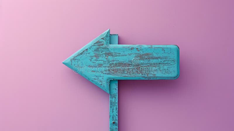 Blue Worn Arrow Sign Pointing Left on a Pink Background. Stock Photo ...