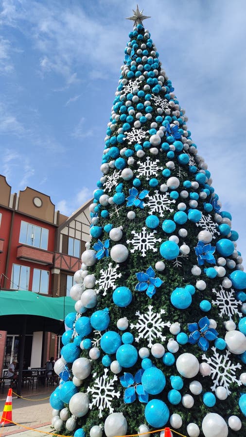 Blue xmas tree in jakarta editorial photography. Image of purple ...