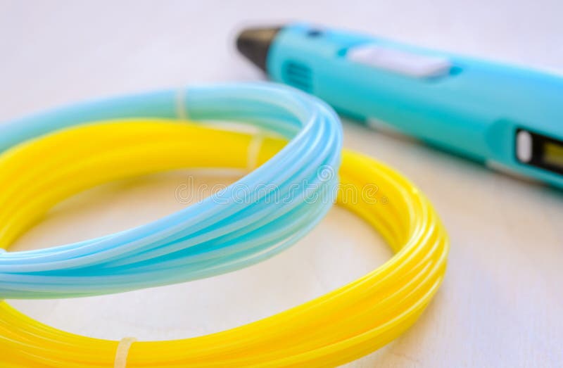 Blue and Yellow ABS Plastic, 3D Pen. Macro Shot Stock Photo - Image of ...