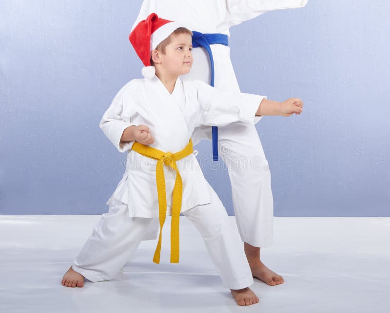 With Blue and Yellow Belt the Boys are Beating Punch Arm Stock Image ...