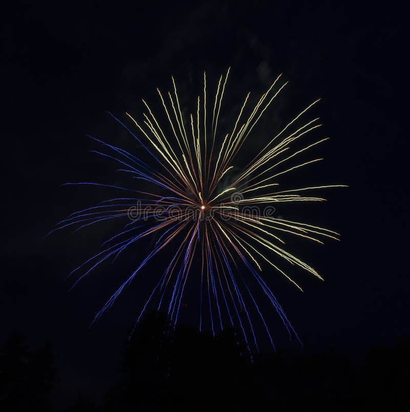 Blue-Yellow Fireworks stock photo. Image of display, pink - 58121522