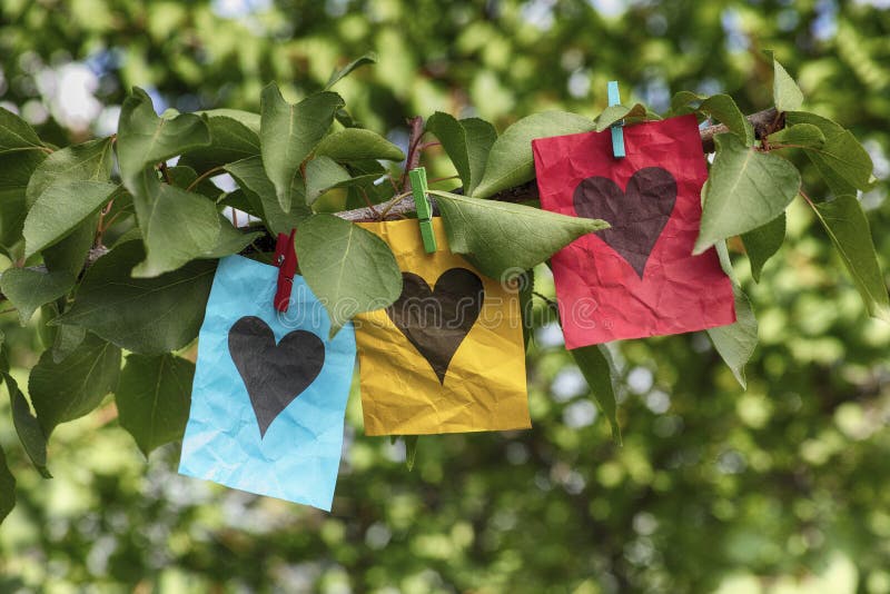 Blue, Yellow and Red Paper Notes with Heart Shapes Stock Image - Image ...
