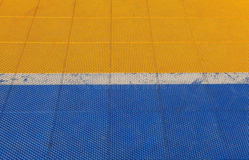 Blue and Yellow Rubber Flooring on Futsal Field Background Stock Image ...