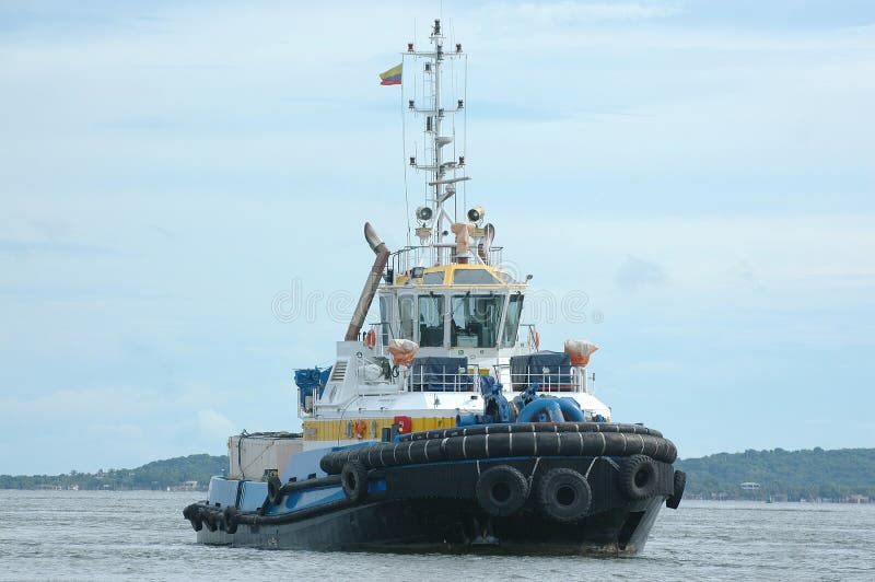 Blue and yellow tugboat 1 stock photo. Image of boat - 16372502