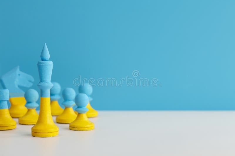 Blue and Yellow Ukrainian Chess Set on Blue Background Stock Photo ...