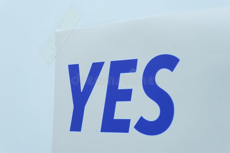 Blue `YES` Paper Attached To a White Wall Stock Photo - Image of paper ...
