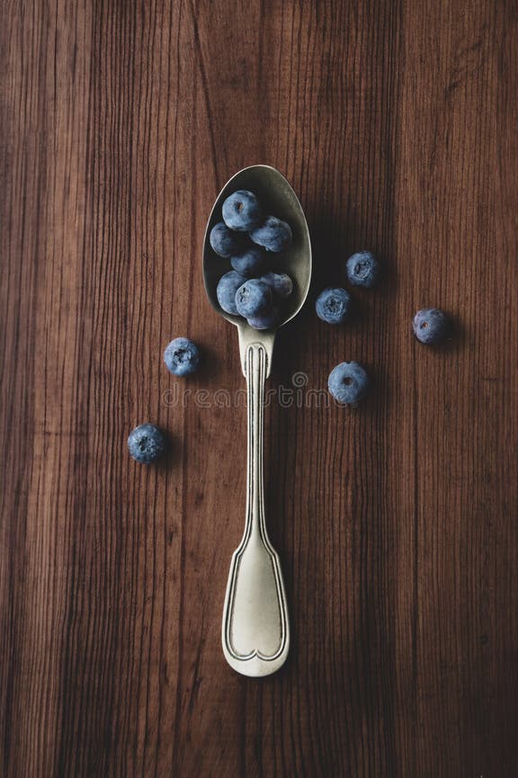 Blueberries Along with a Spoon on a Wood Table Stock Image - Image of ...