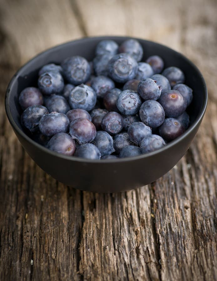 Blueberries in a bowl stock photo. Image of fixing, blueberry - 25030434