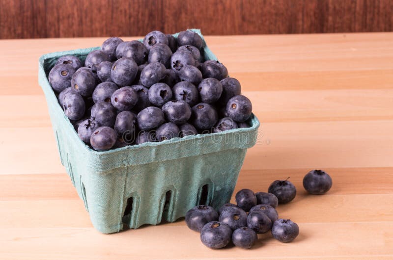 Blueberries in container stock photo. Image of white - 70746666
