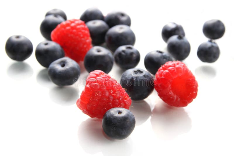 Blueberries and Raspberries Stock Image - Image of pink, blue: 19754103