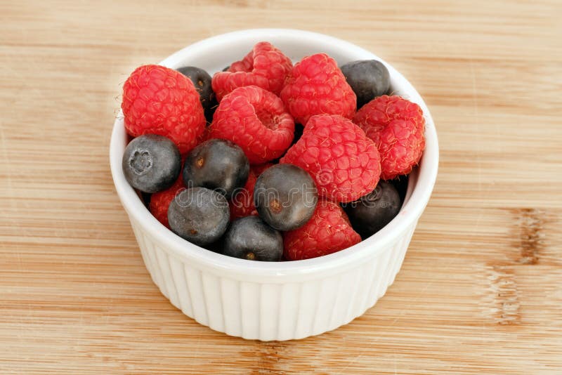 Blueberries and Raspberries in a Cup Stock Image - Image of macro ...