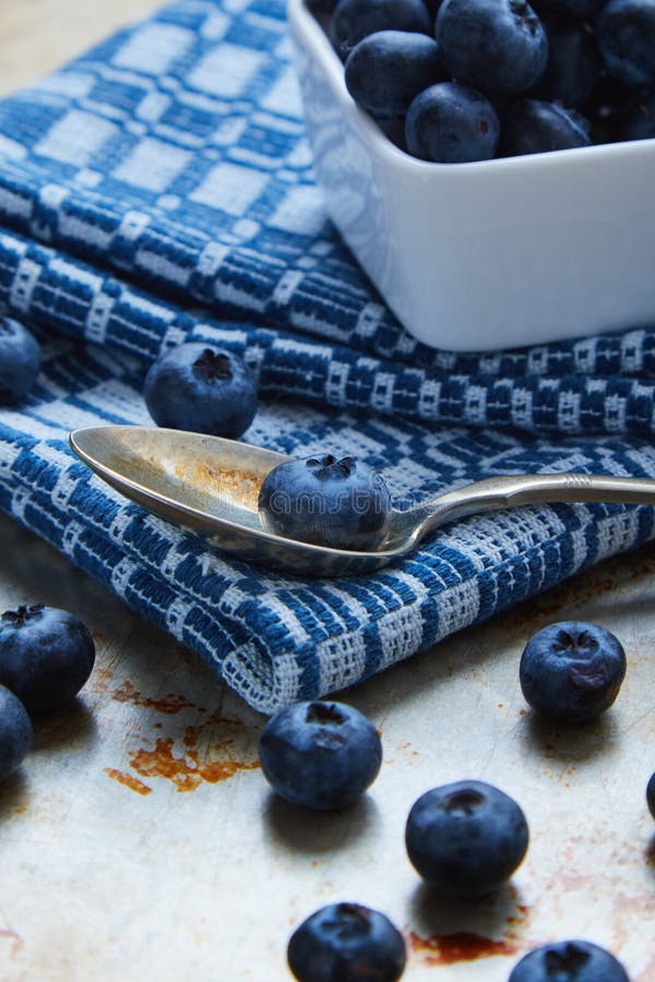 Blueberries on steel table stock photo. Image of blueberry - 62405448
