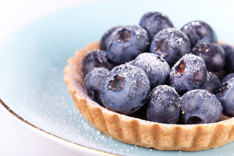 Blueberries Tart on the Blue Plate Stock Image - Image of seasonal ...