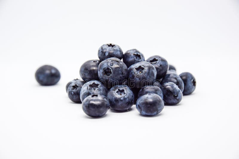 Blueberries on a White Background. a Handful of Blueberries on a White ...