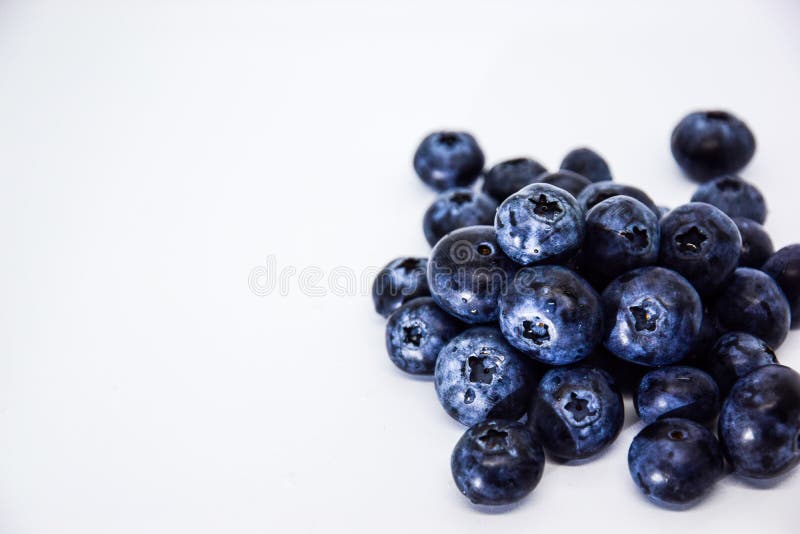 Blueberries on a White Background. a Handful of Blueberries on a White ...